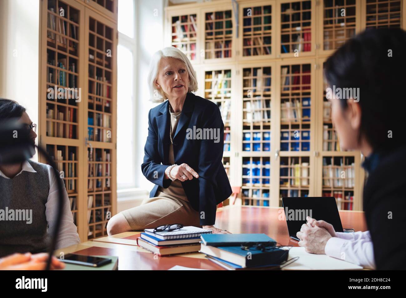 Justice law sitting gesturing communication hi-res stock photography ...