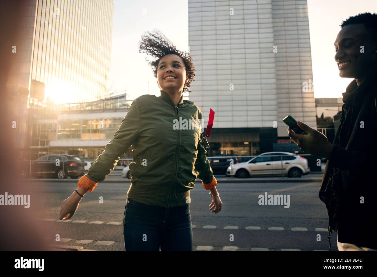 Standing against wind two people hi-res stock photography and images ...