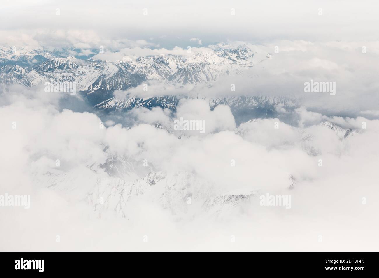 An aerial view of mountain tops and glaciers of Harriman Fiord, Alaska ...