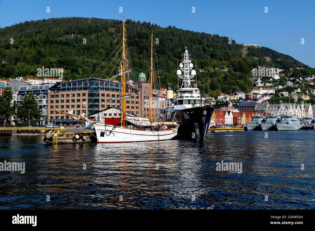 Expedition yacht Sherpa in the port of Bergen, Norway. In front is the ...
