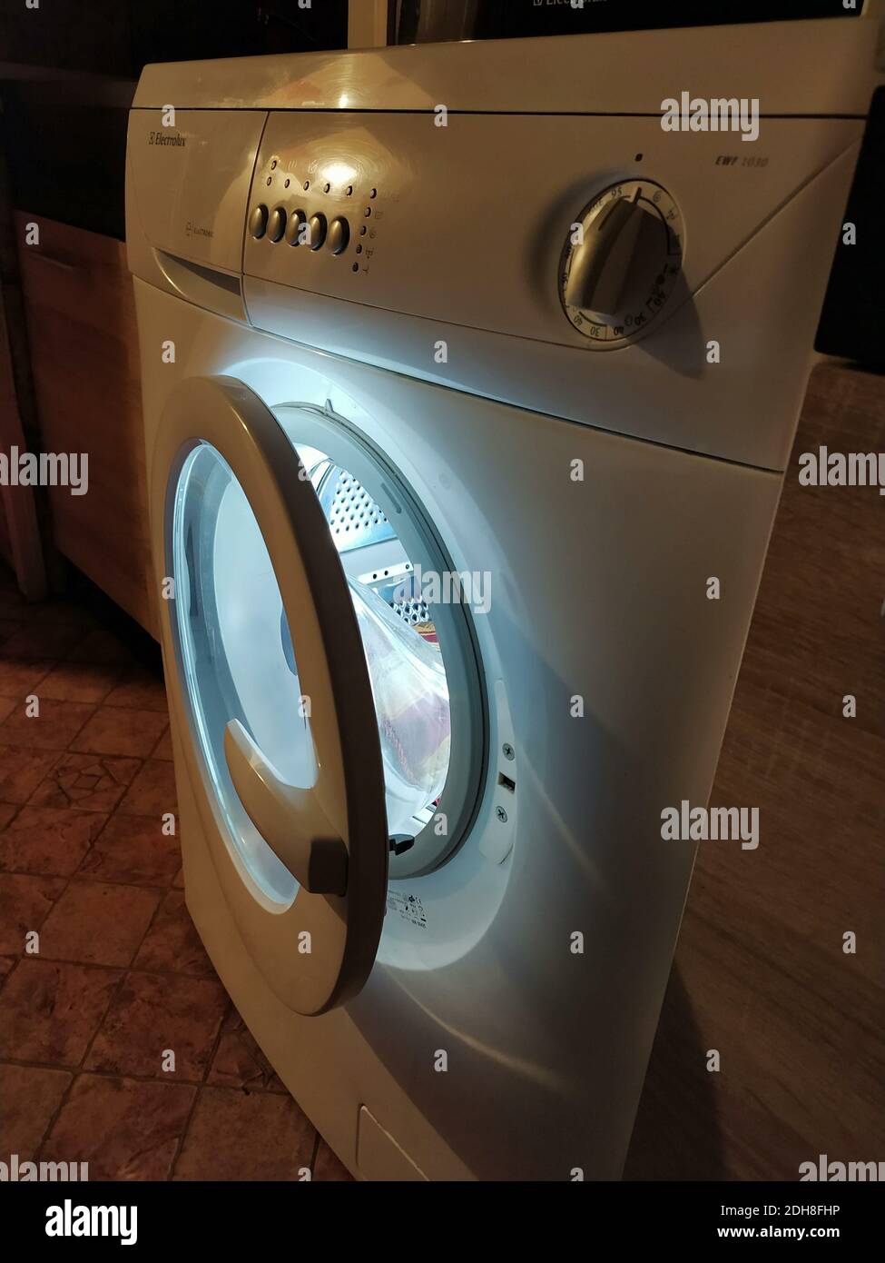 Washing machine in the kitchen Stock Photo - Alamy