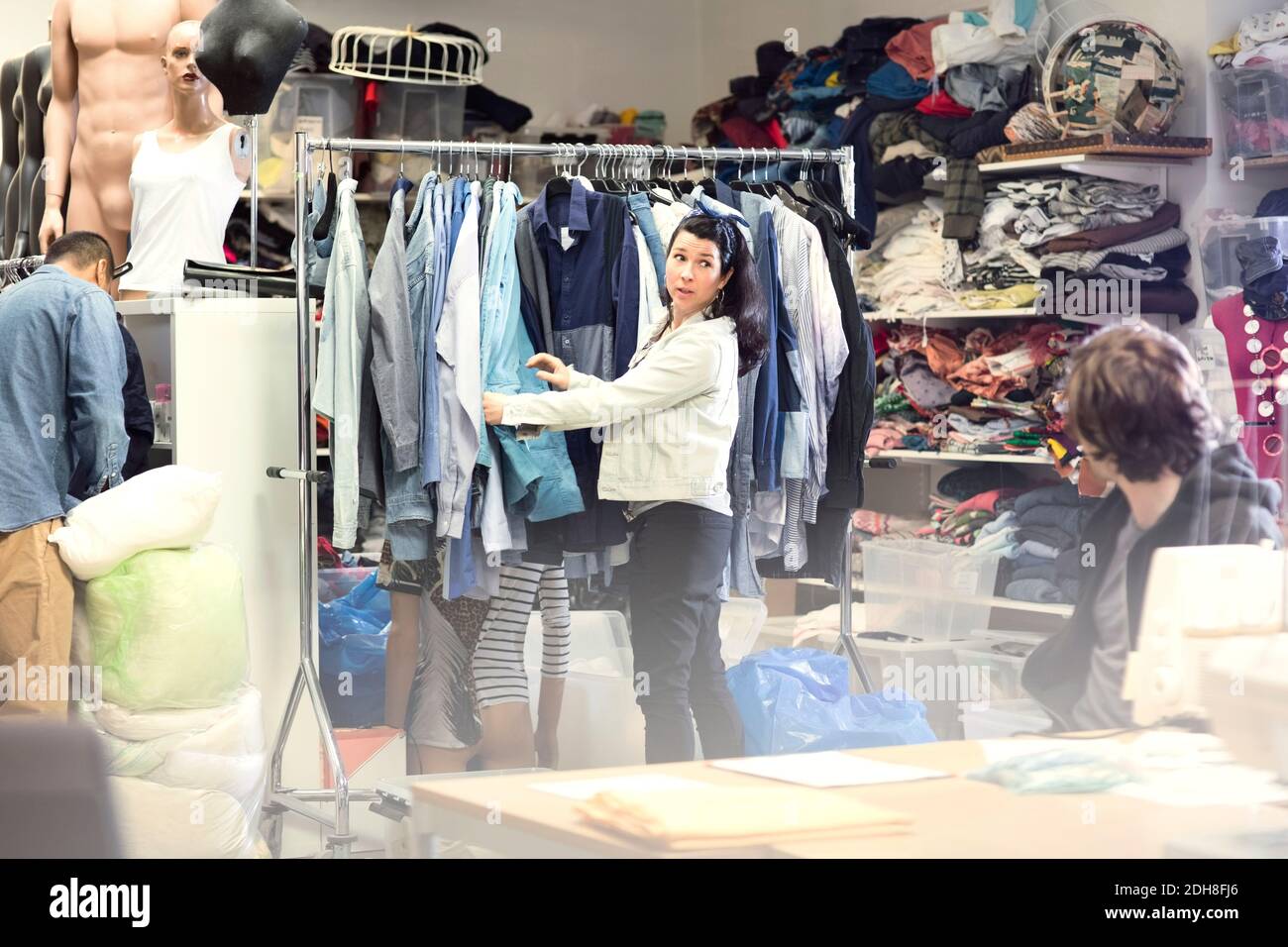 Searching for clothes hi-res stock photography and images - Alamy