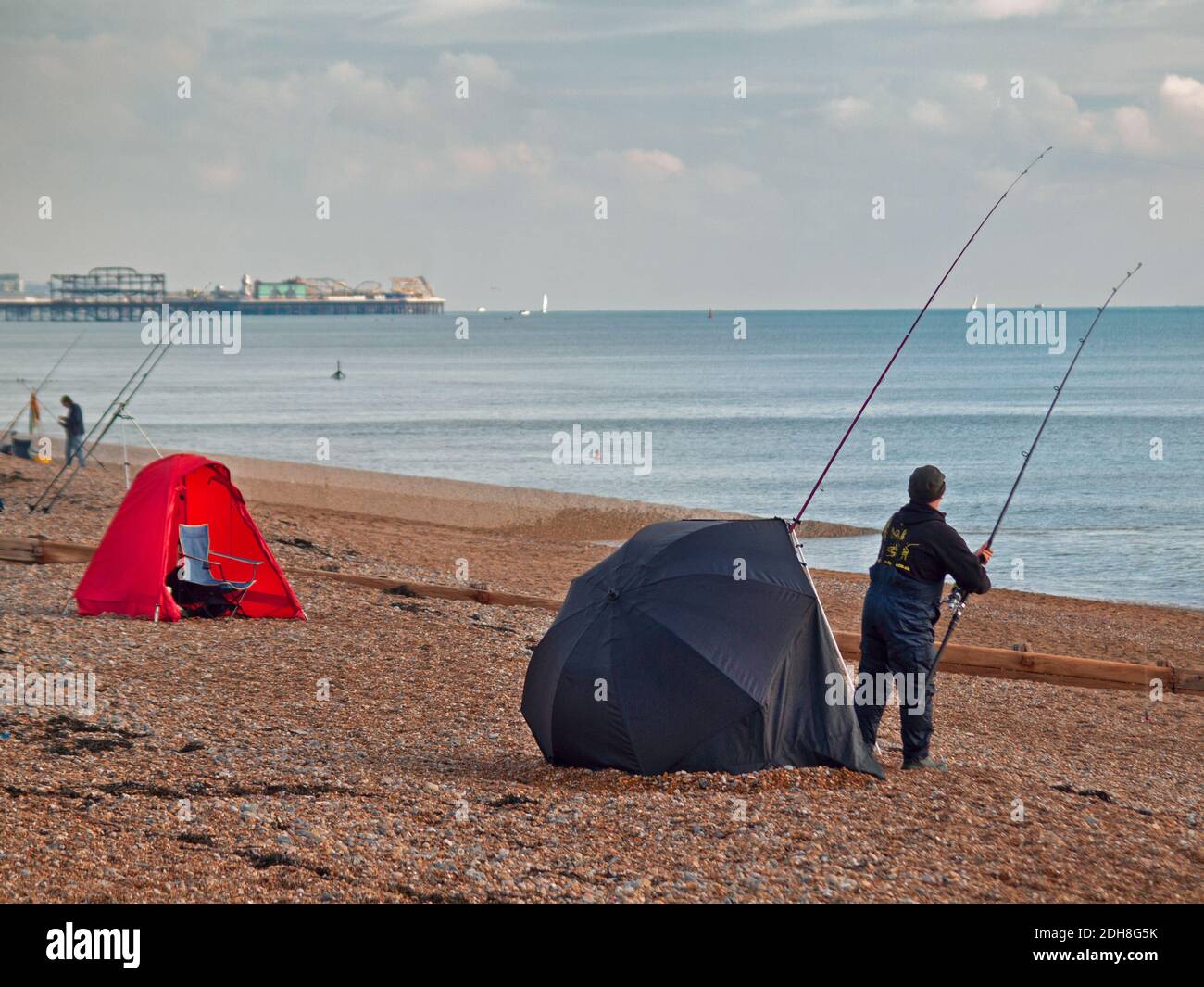 Sea fishing on the beach at Brighton Stock Photo - Alamy