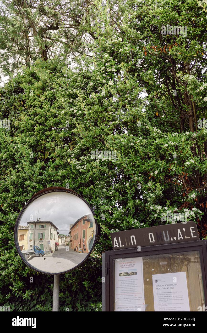 Parabolic mirror reflecting the center of a small Italian village Stock ...