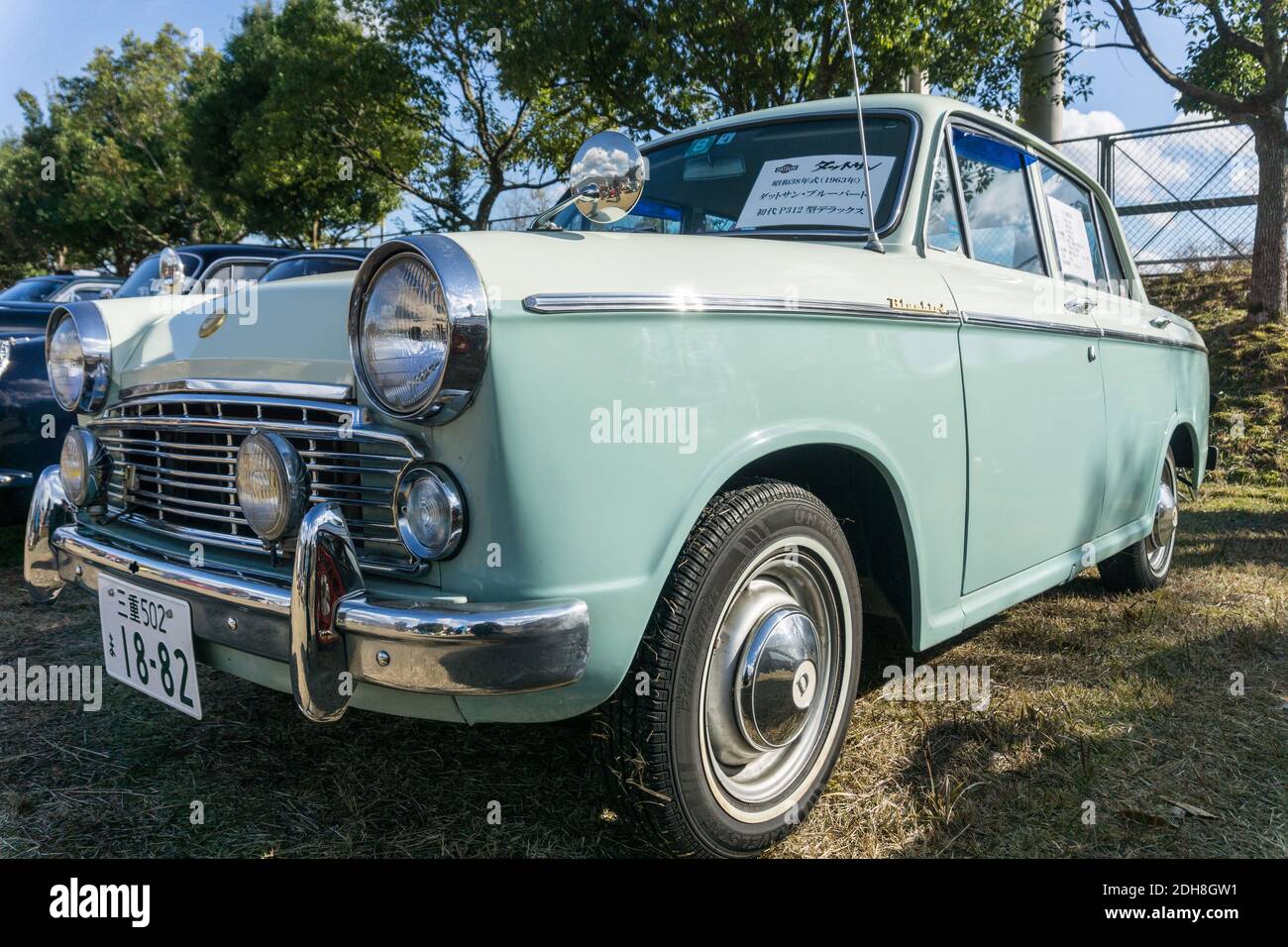 Close up front view of a 1962 Datsun Bluebird 1200 Deluxe P312 parked ...