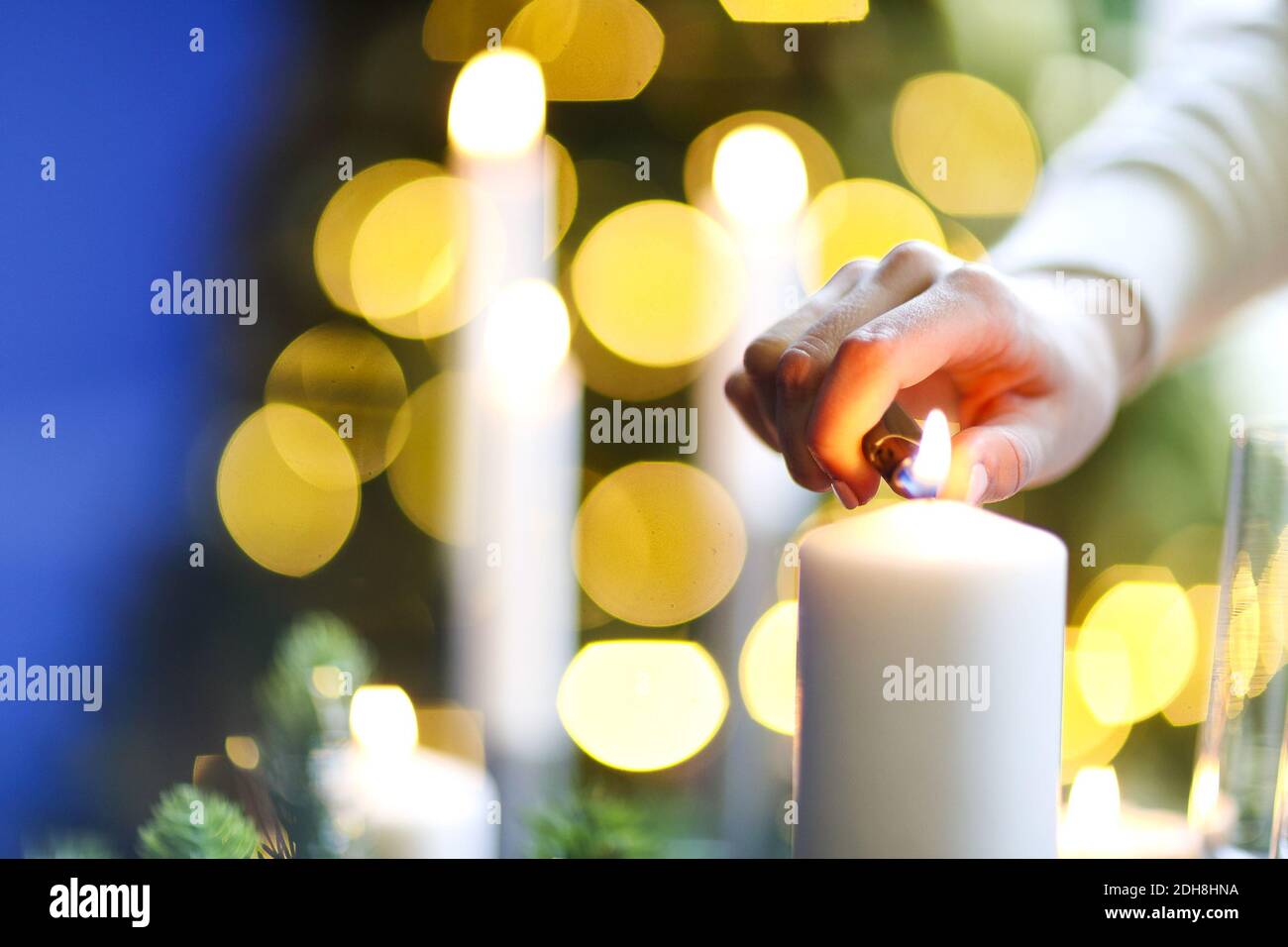 Crop woman burning candle anonymous hi-res stock photography and images ...