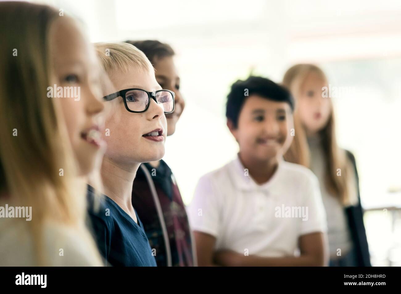 Five children standing hi-res stock photography and images - Alamy