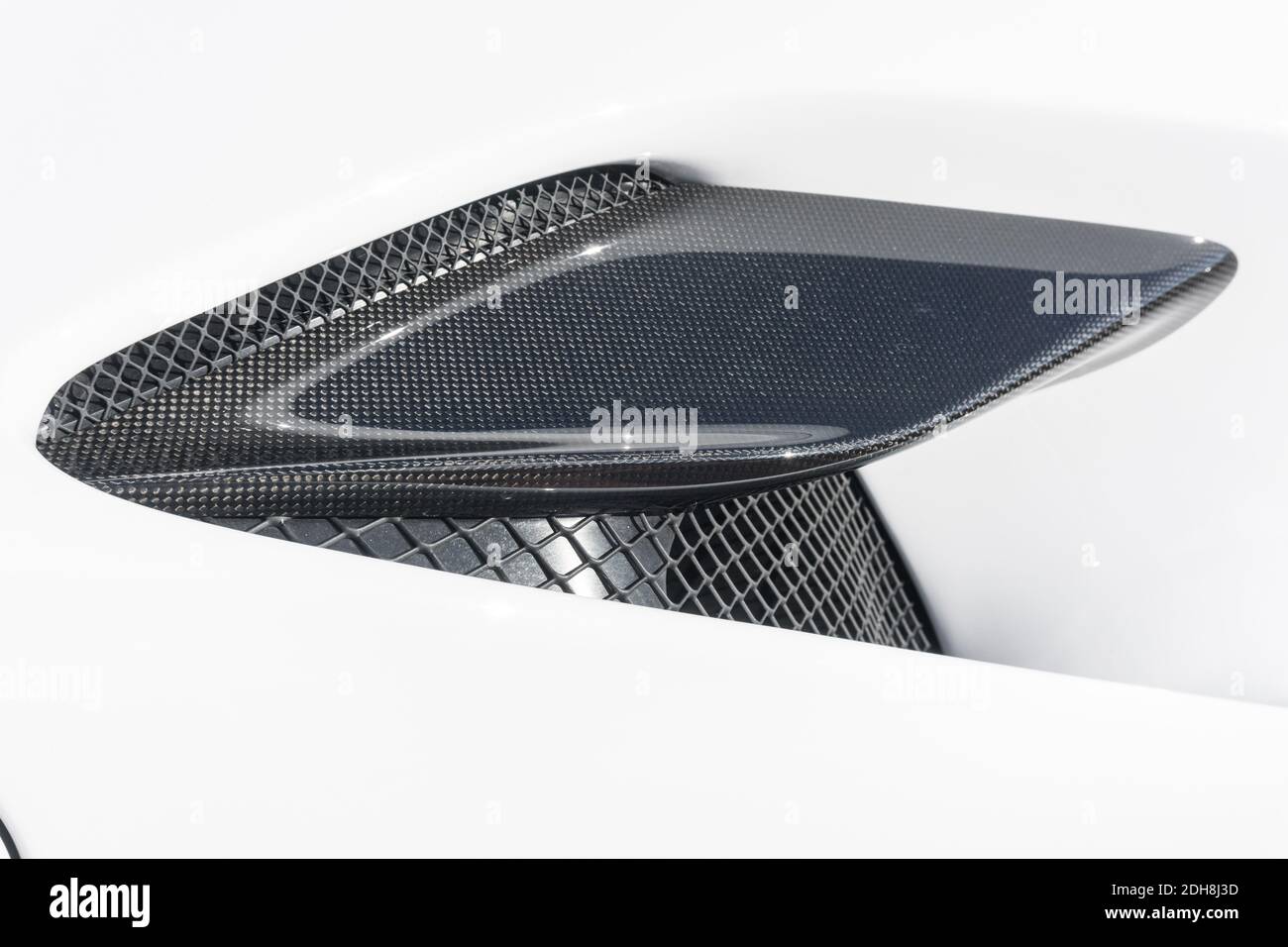Close up detail of the carbon fibre insert on the side air intake of a ...