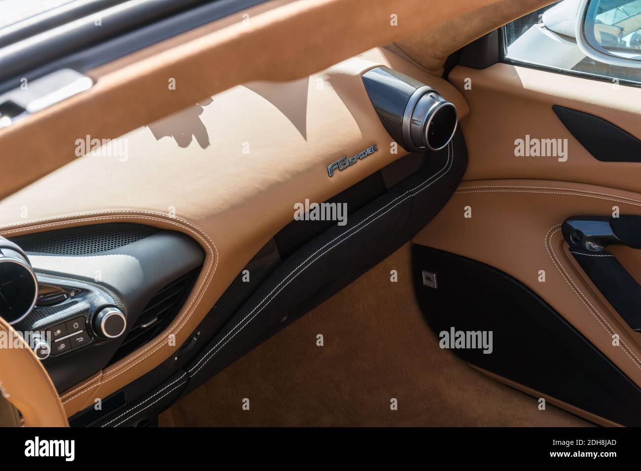 Close up detail of the leather interior and dashboard of a white ...