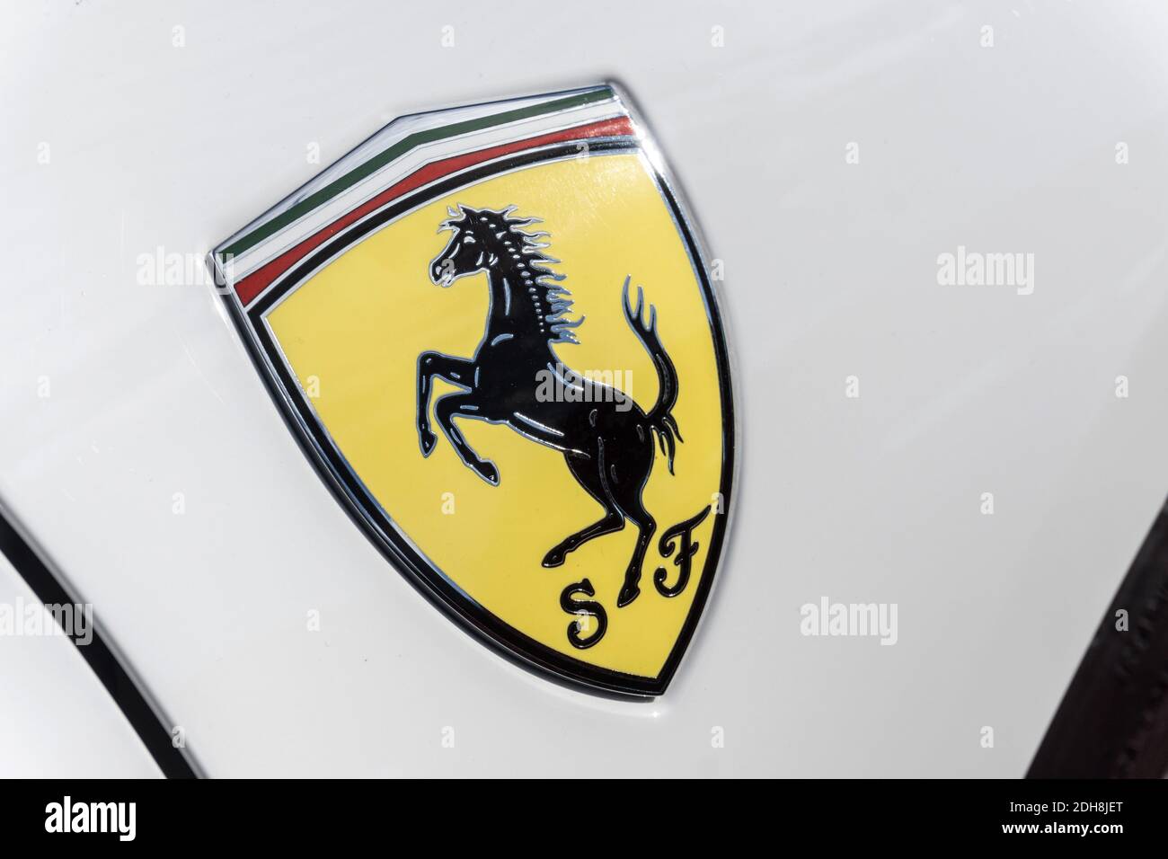 Close up detail of the emblem prancing horse logo badge on the side of ...