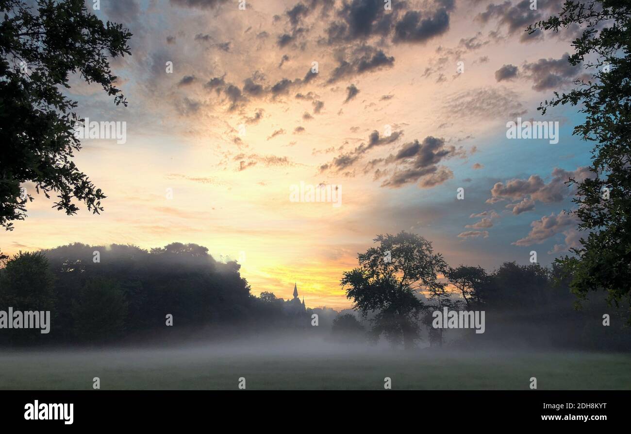 Beautiful sunrise over misty cloudy hi-res stock photography and images ...