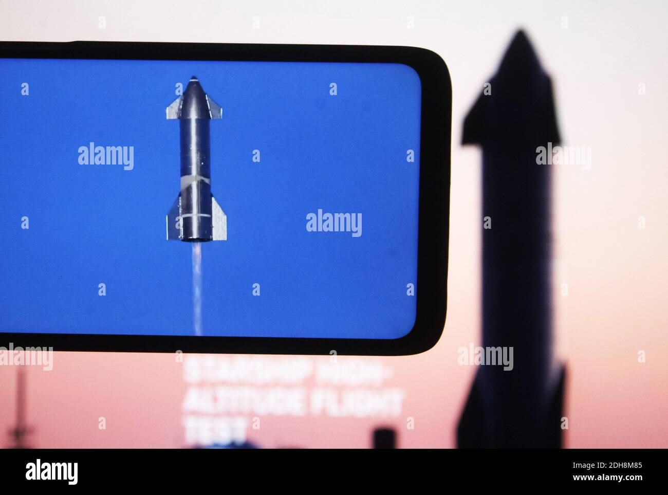 In this photo illustration, the launch of a starship SN8 prototype ...