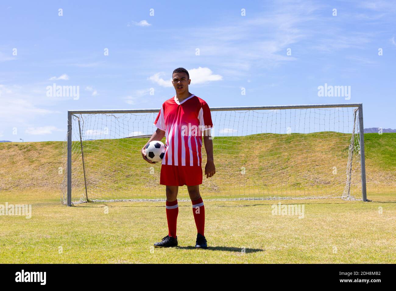 Soccer player with ball Stock Photo - Alamy