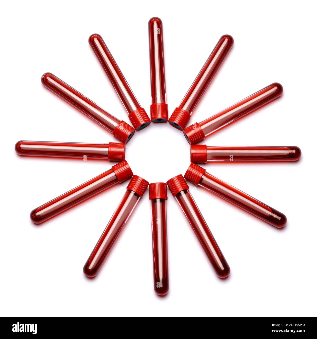 Test tubes with red plug isolated on white background Stock Photo - Alamy