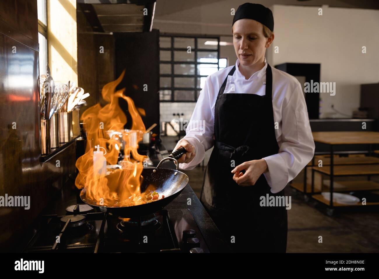 Professional chef fire cooking vegetables hi-res stock photography and ...