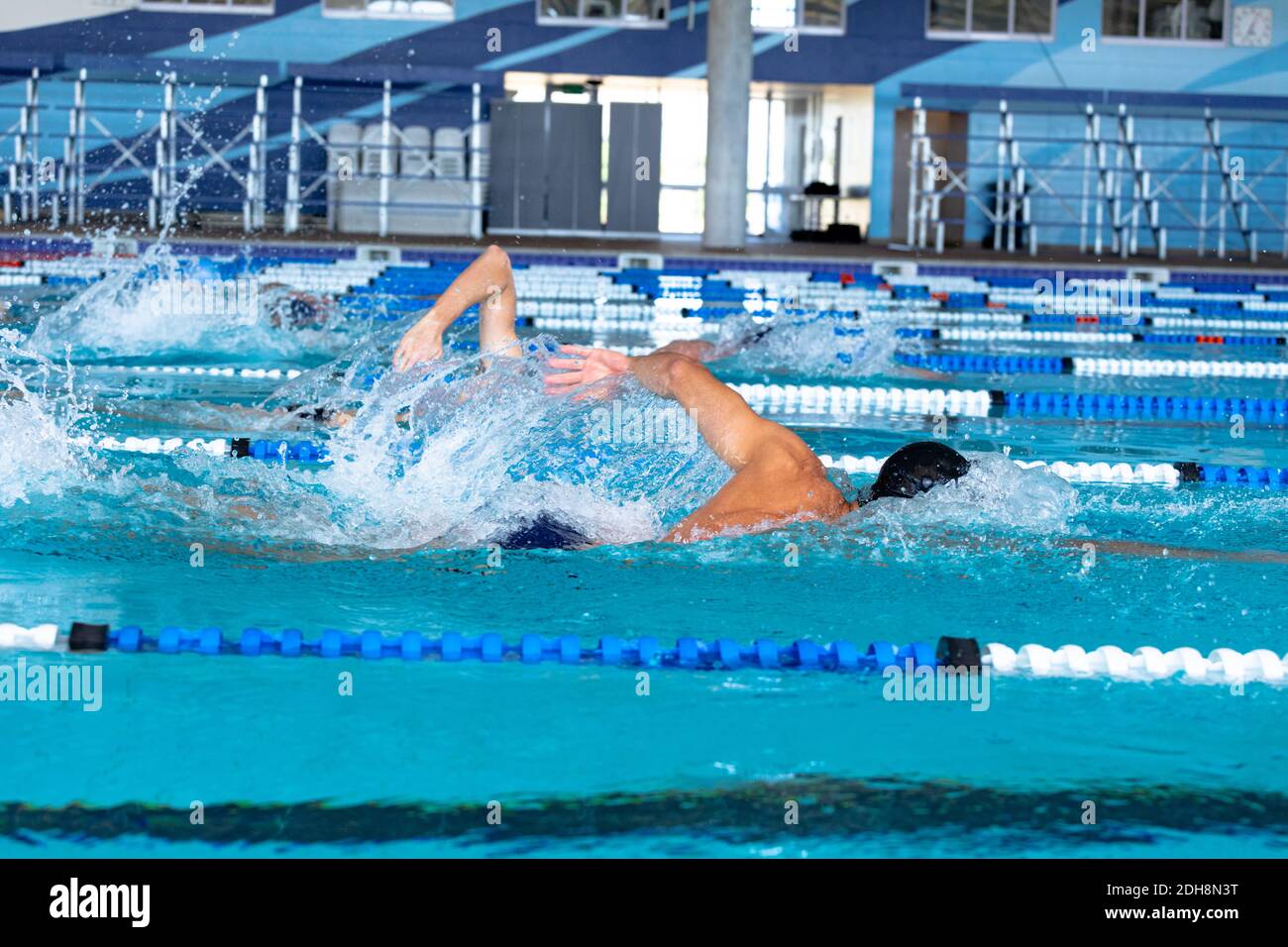 Swimmers competing in pool race hi-res stock photography and images - Alamy