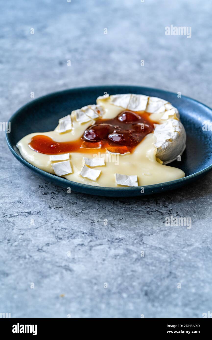 Baked Brie Cheese Dessert with Strawberry Jam. Marmalade Melted ...
