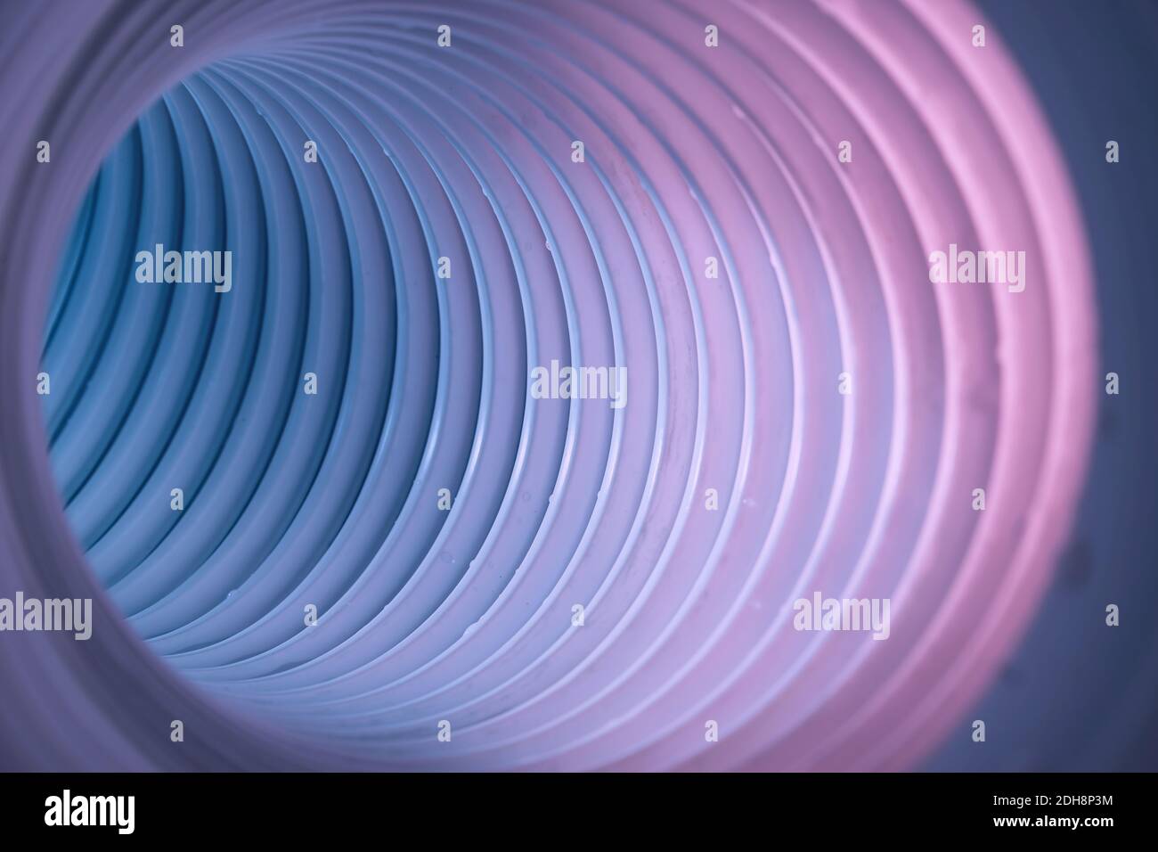 Beautiful round abstract blue tunnel with color light on a background ...