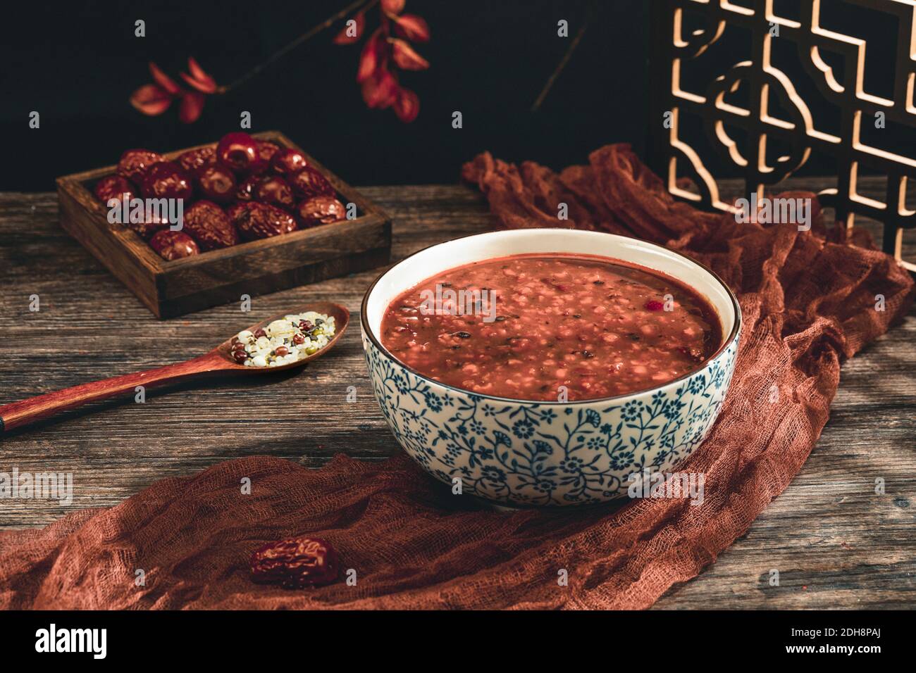 A closeup of a soap made out of kidney beans in a white and blue bowl ...