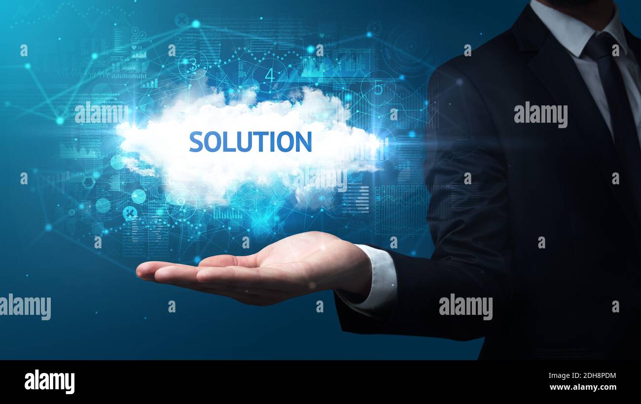 Hand of Businessman holding SOLUTION inscription, successful business ...
