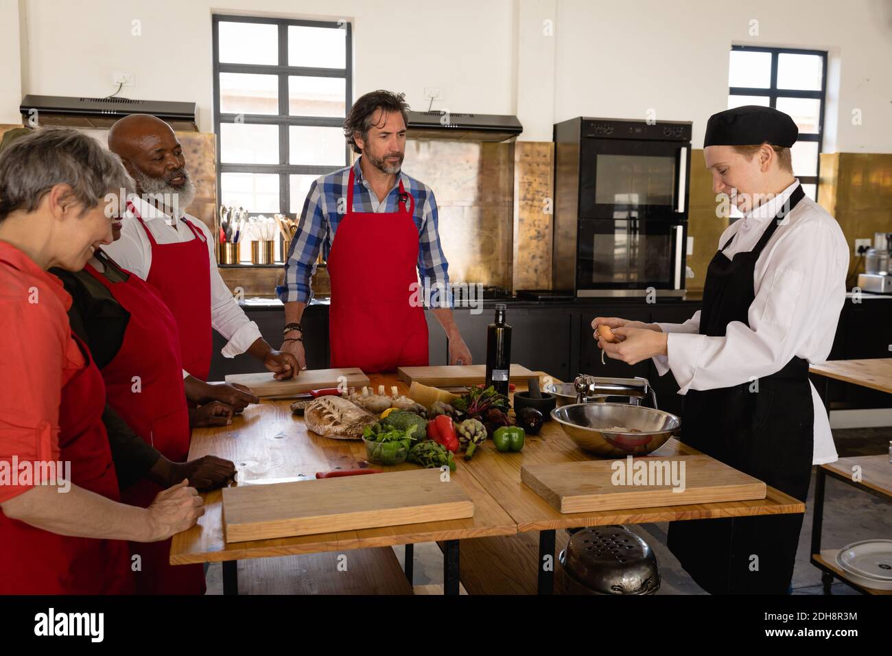 Chef explaining while cooking Stock Photo - Alamy Chef explaining while cooking Stock Photo - Alamy