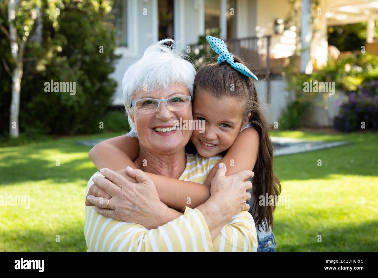 Family outside together in summer Stock Photo - Alamy