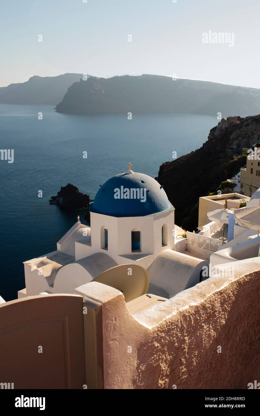 Famous blue domes of churches in Oia, cityscape at Santorini, Greece ...
