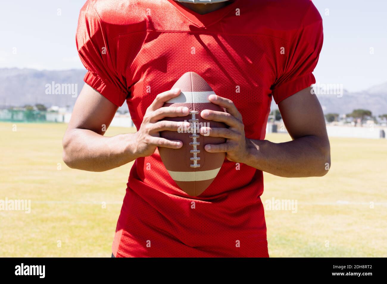 Football player with ball Stock Photo - Alamy