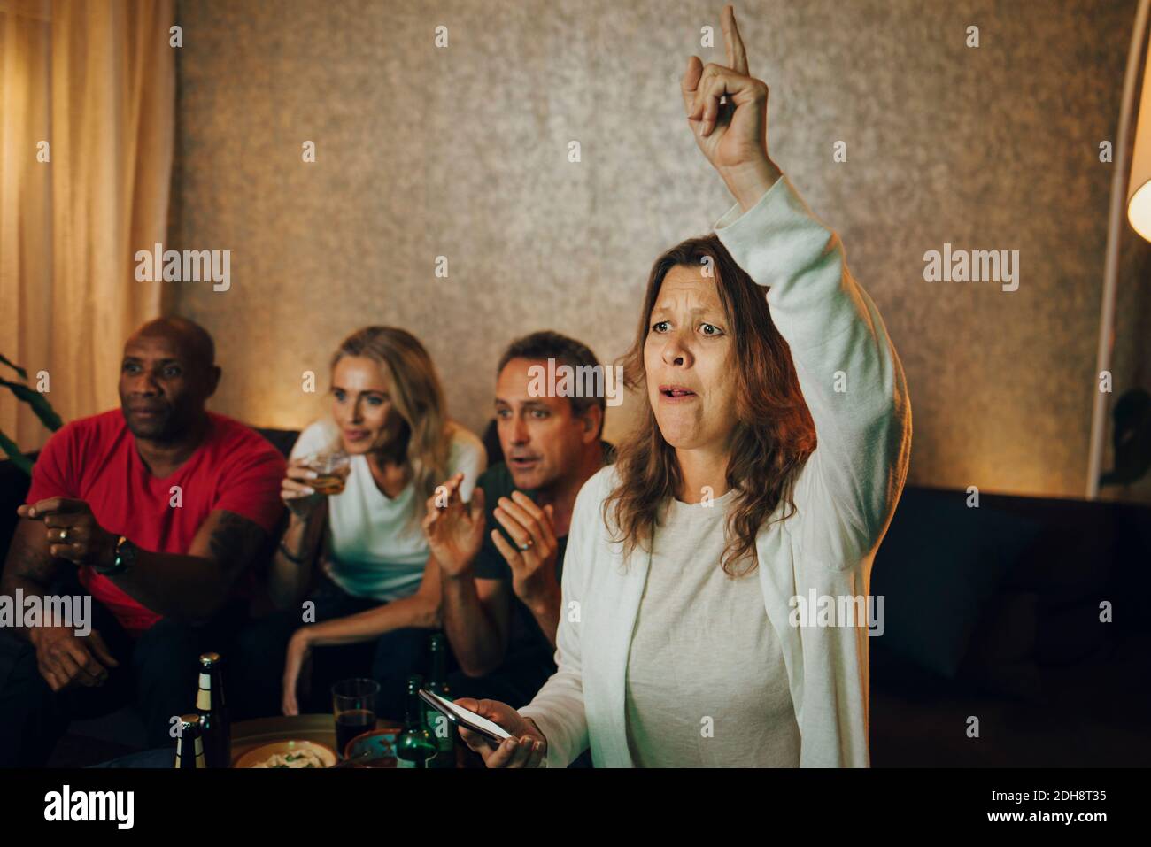 Four friends holding hands arms hi-res stock photography and images - Alamy