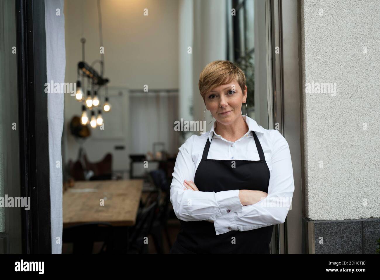 Professional standing hi-res stock photography and images - Alamy