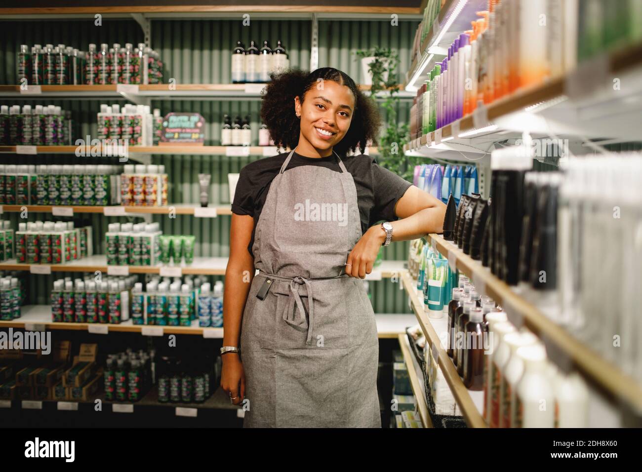 Portrait saleswoman in apron hi-res stock photography and images - Alamy
