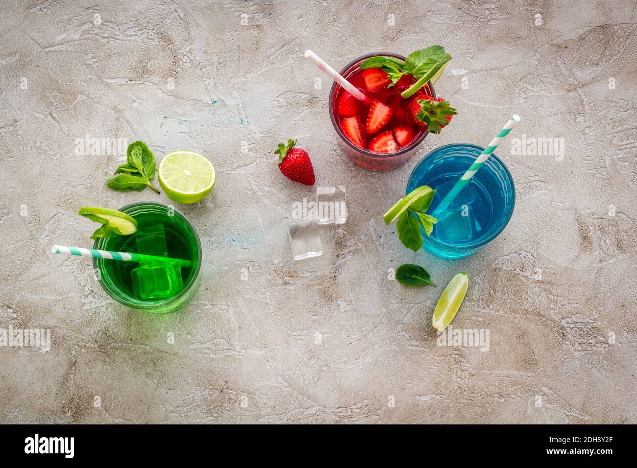 Set of different drinks cocktails with ice - red blue and green. Top ...