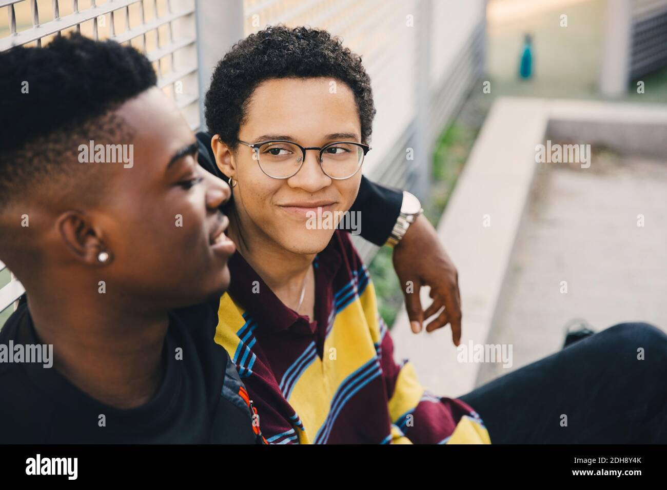 Friend looking out for each other hi-res stock photography and images ...