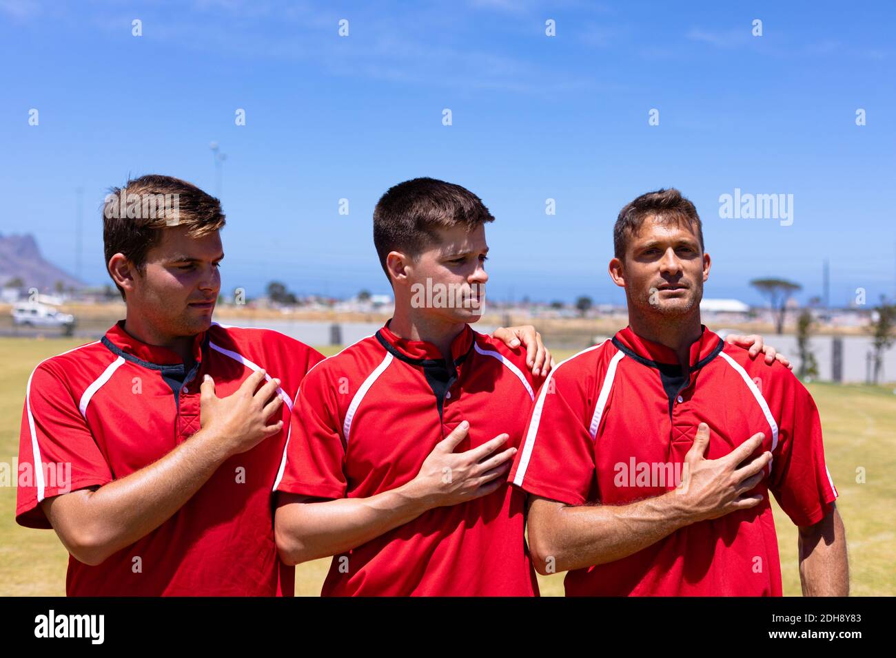 Soccer players singing national anthem hi-res stock photography and ...