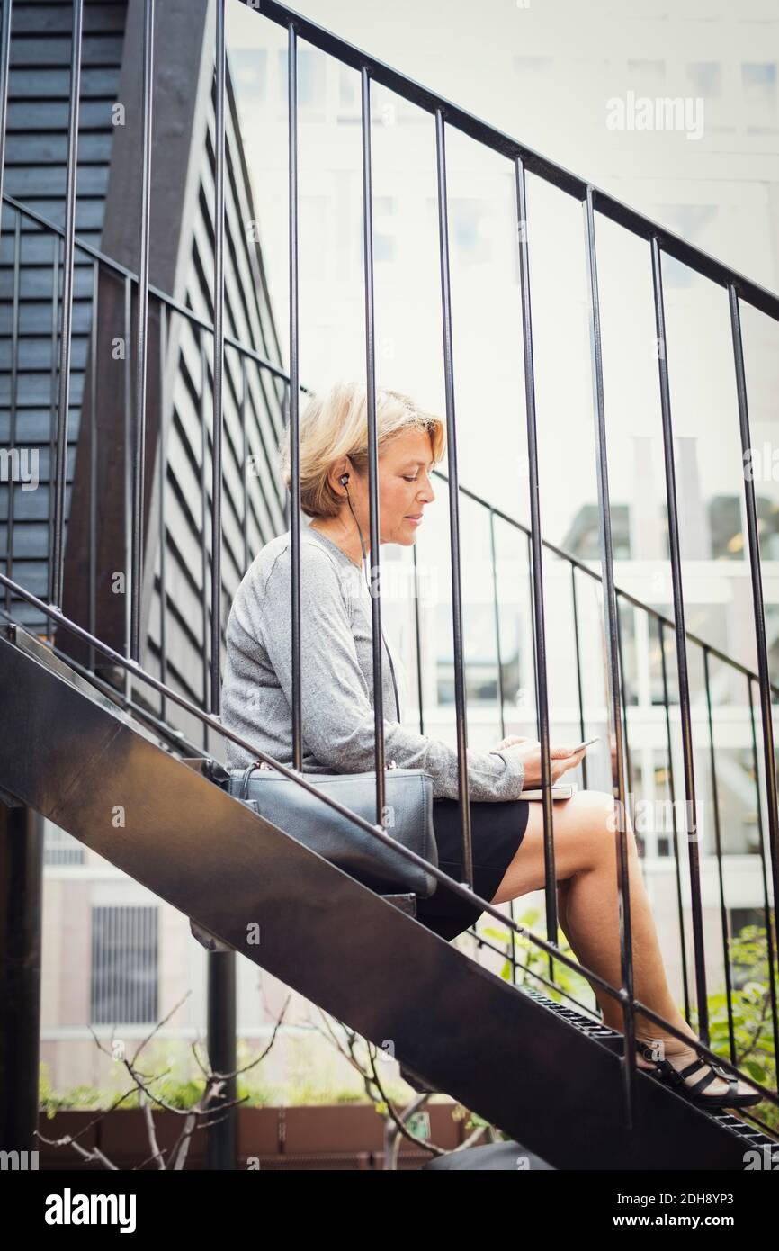 Side profile mature woman sitting hi-res stock photography and images ...