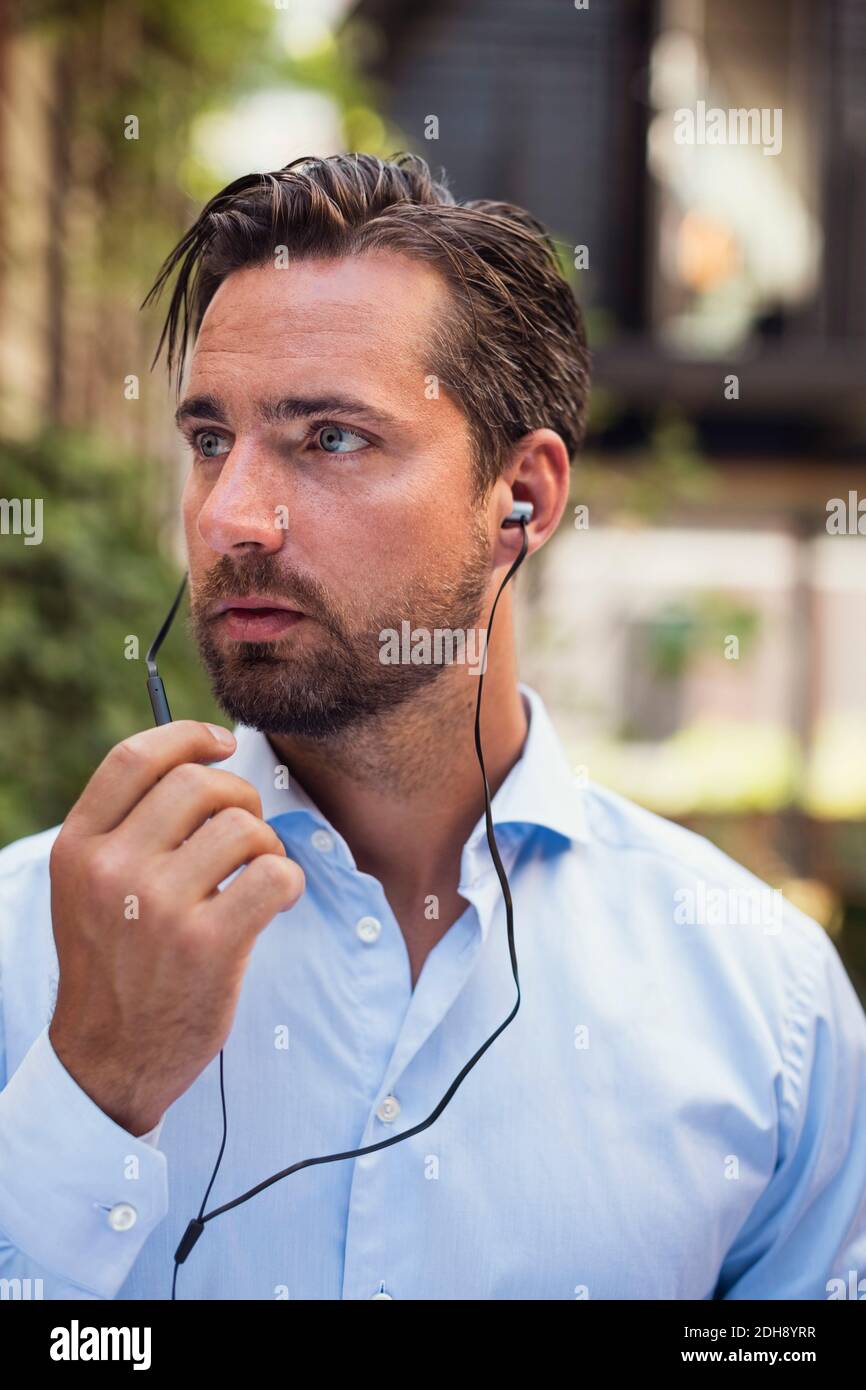 Businessman talking on microphone hi-res stock photography and images ...