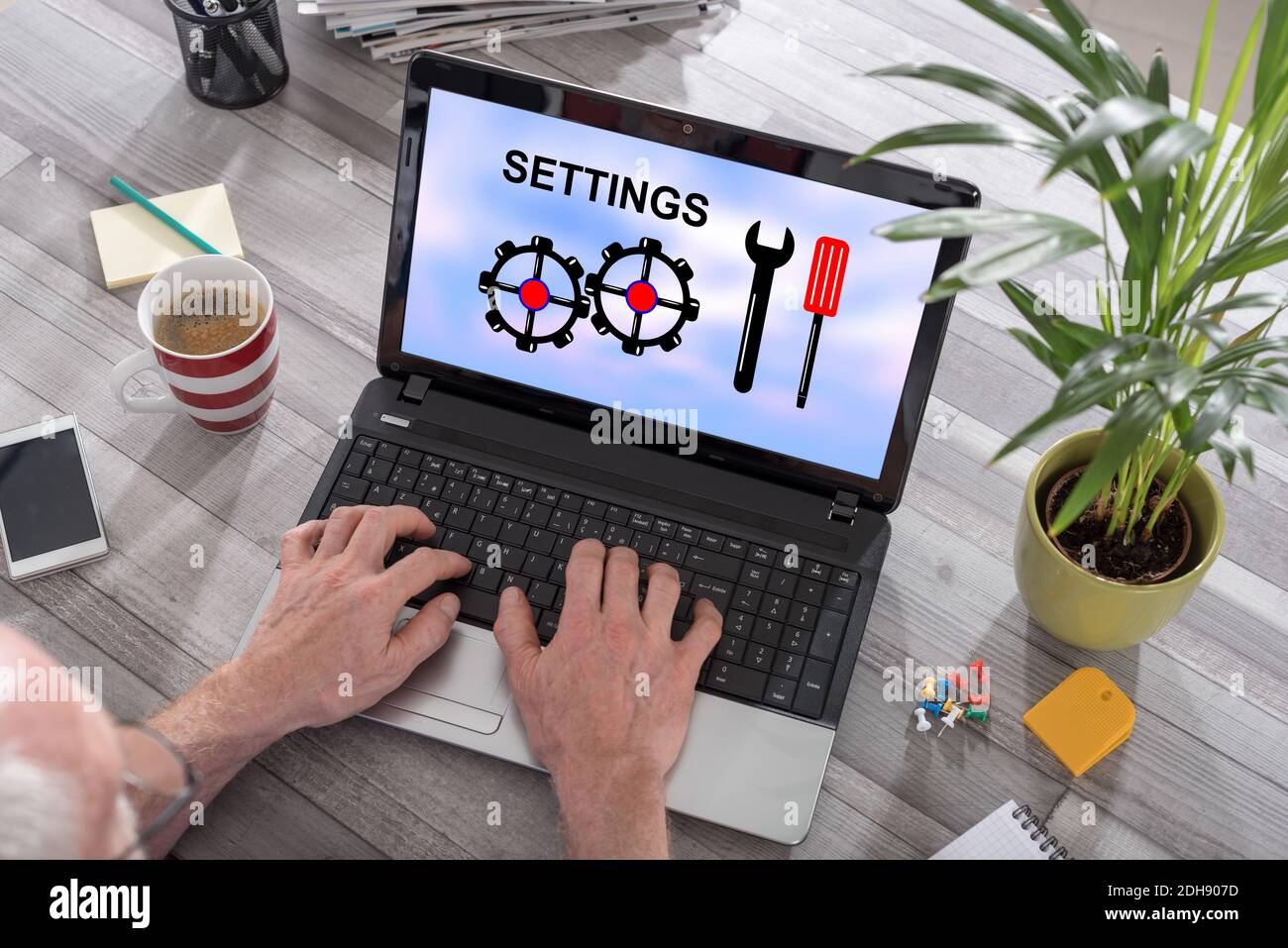 Laptop setting tools hi-res stock photography and images - Alamy