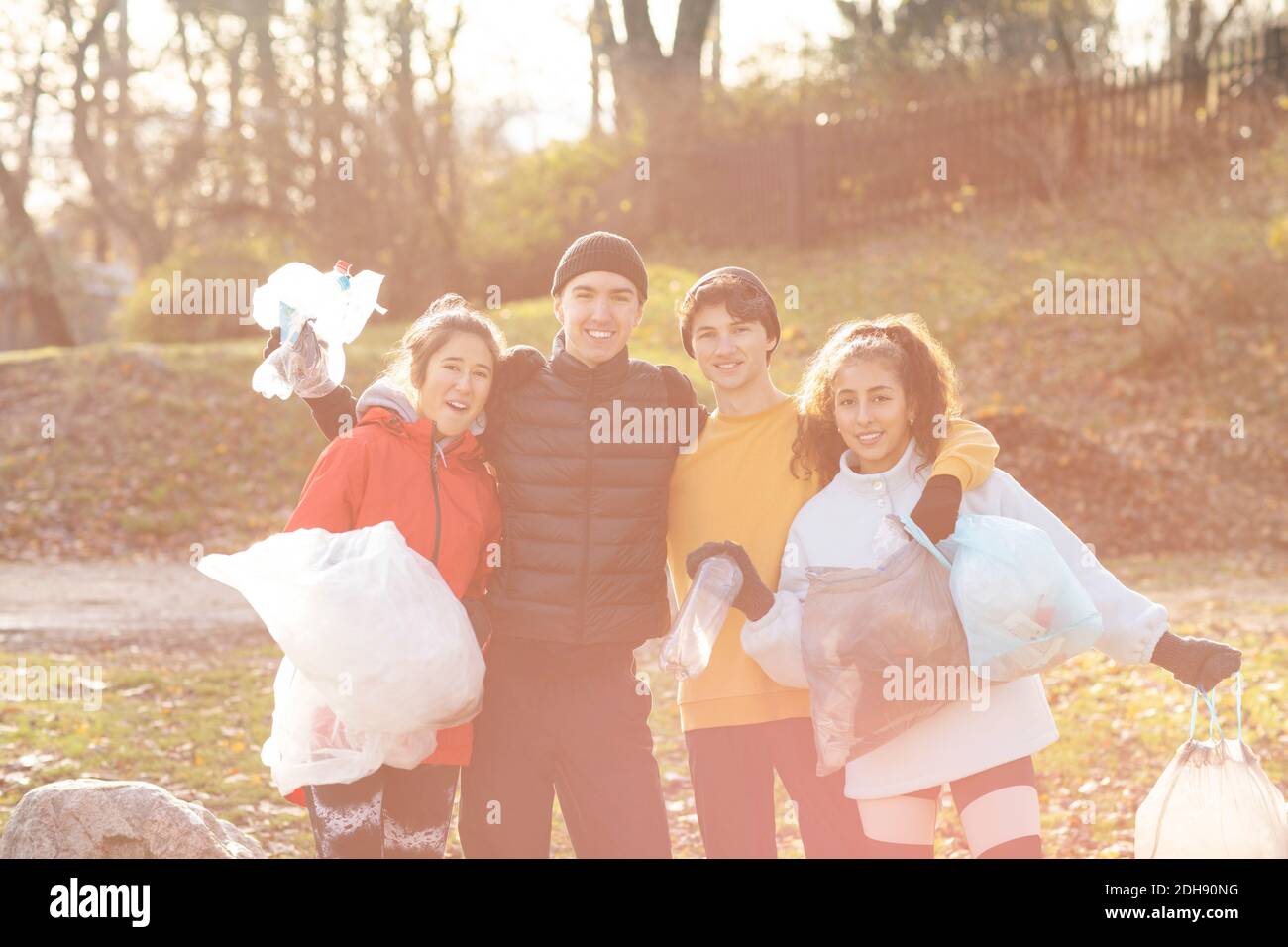 Arms up smiling standing holding hi-res stock photography and images ...
