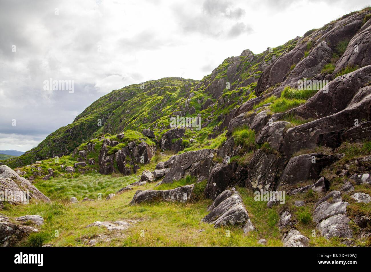 Big rocks and grass on Molls Gap in Ring of Kerry Stock Photo - Alamy