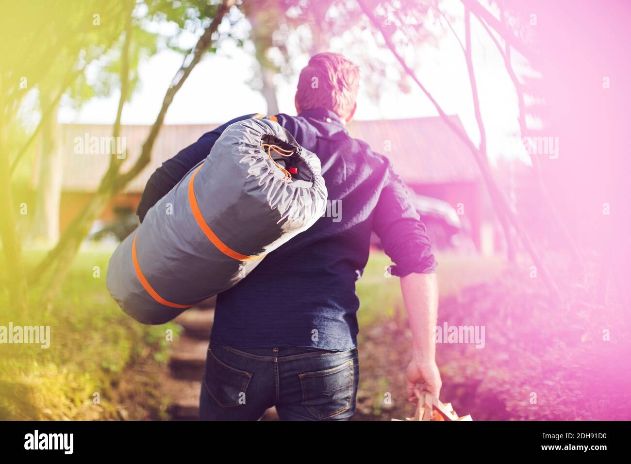 Man carrying sack on his back hi-res stock photography and images - Alamy