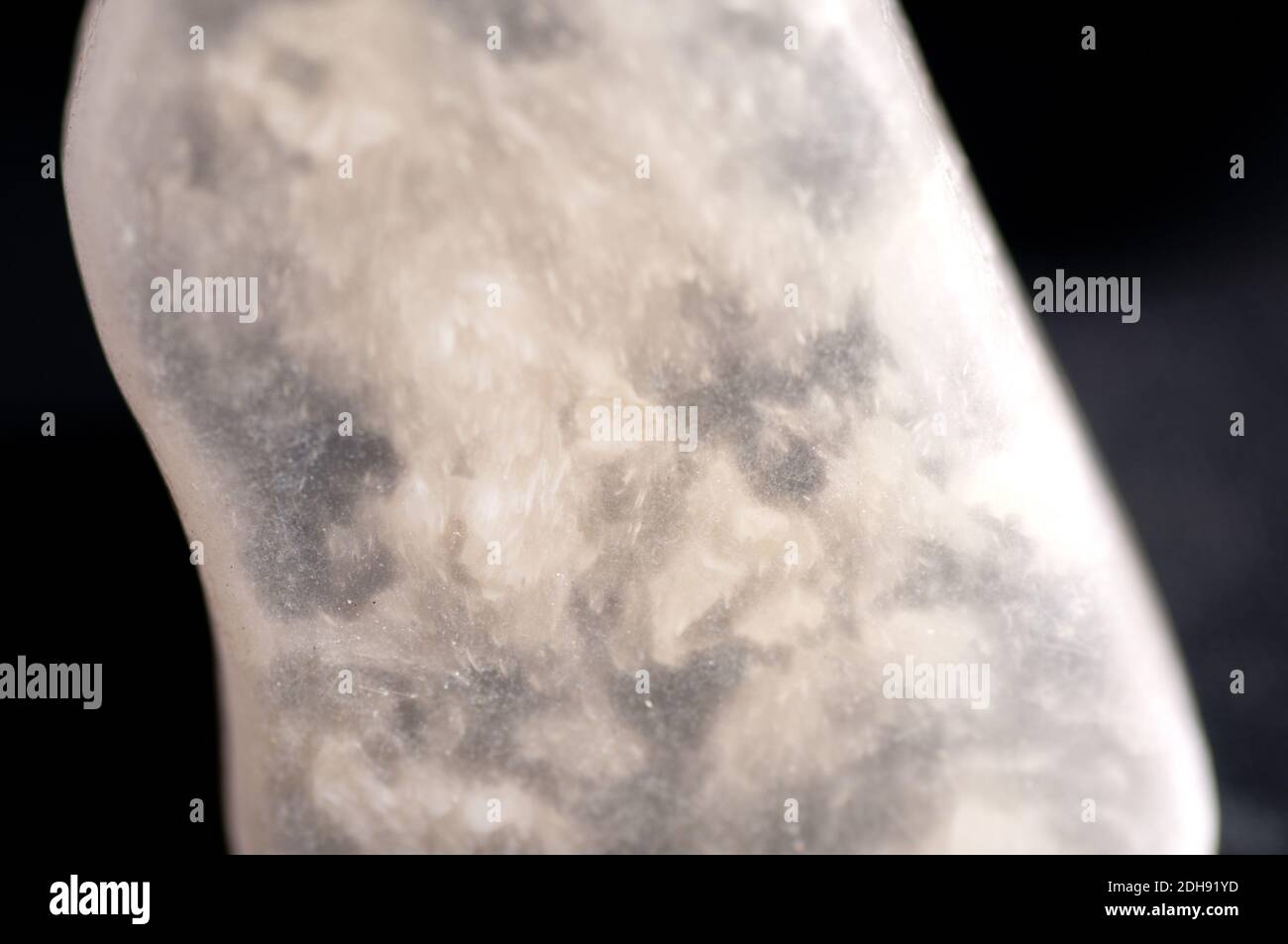 ulextite or tv rock mineral sample, white translucent stone Stock Photo ...