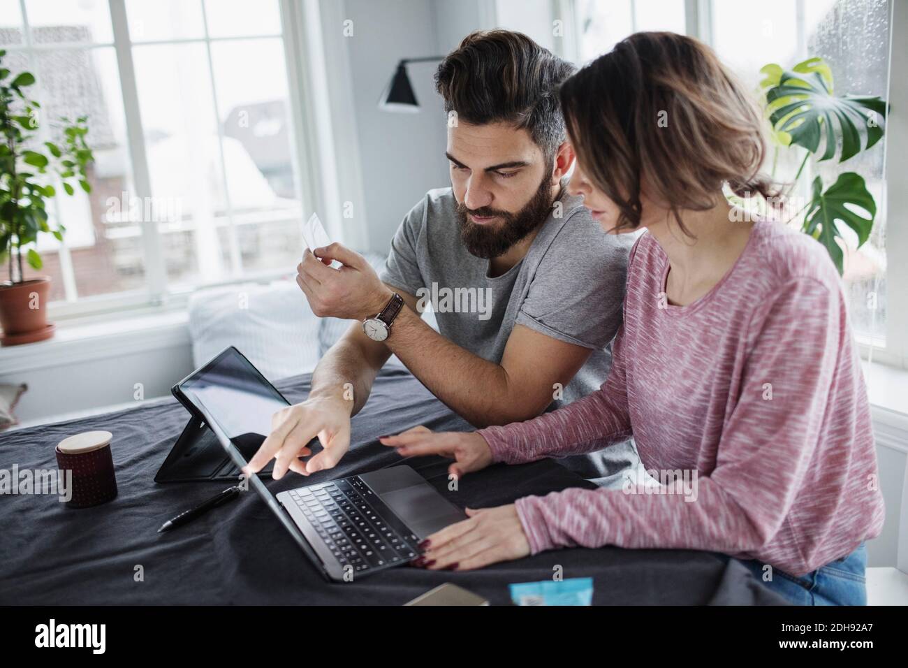 Two tables laptop digital hi-res stock photography and images - Alamy