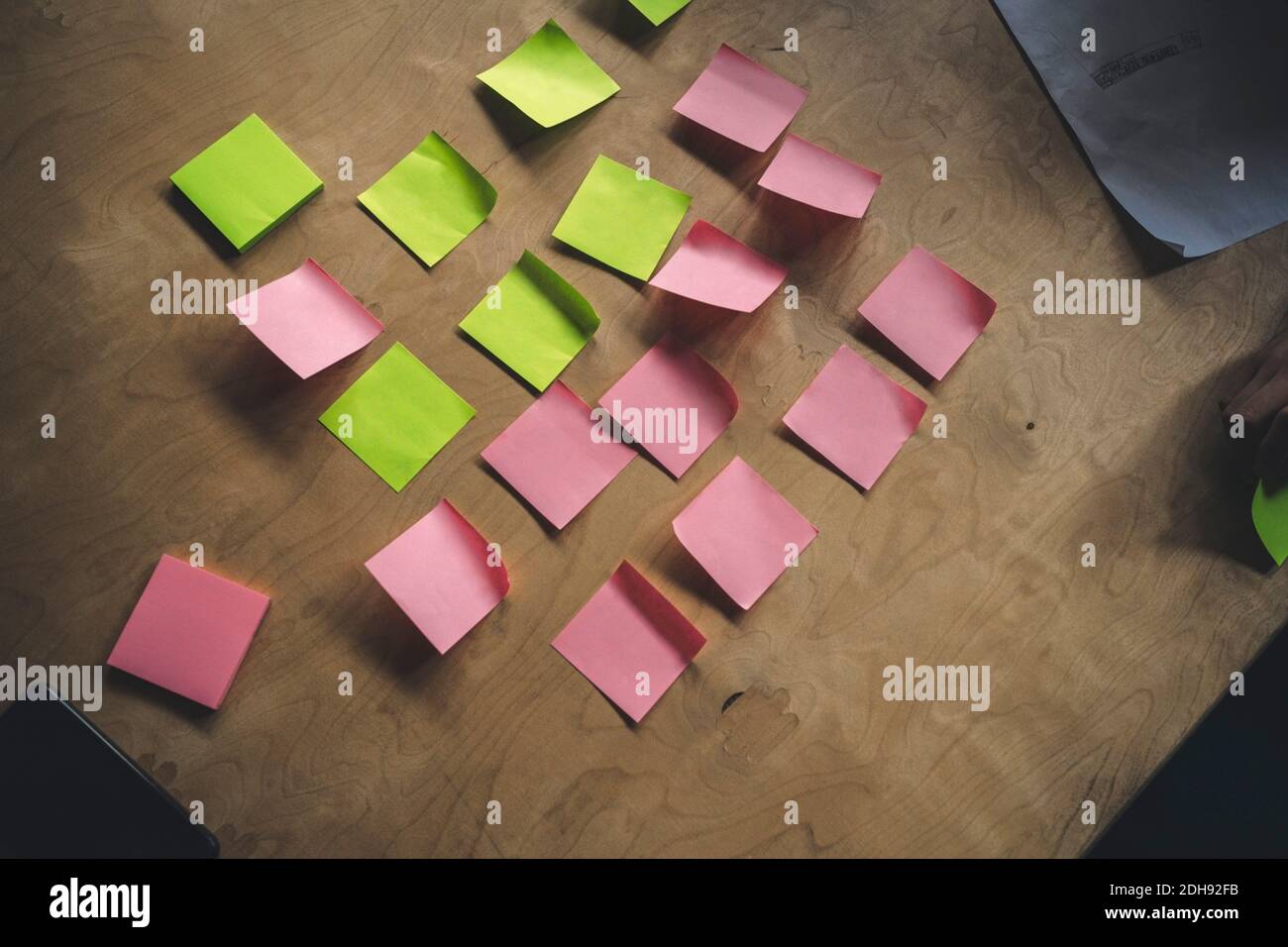 High angle view of sticky notes on desk at workplace Stock Photo - Alamy