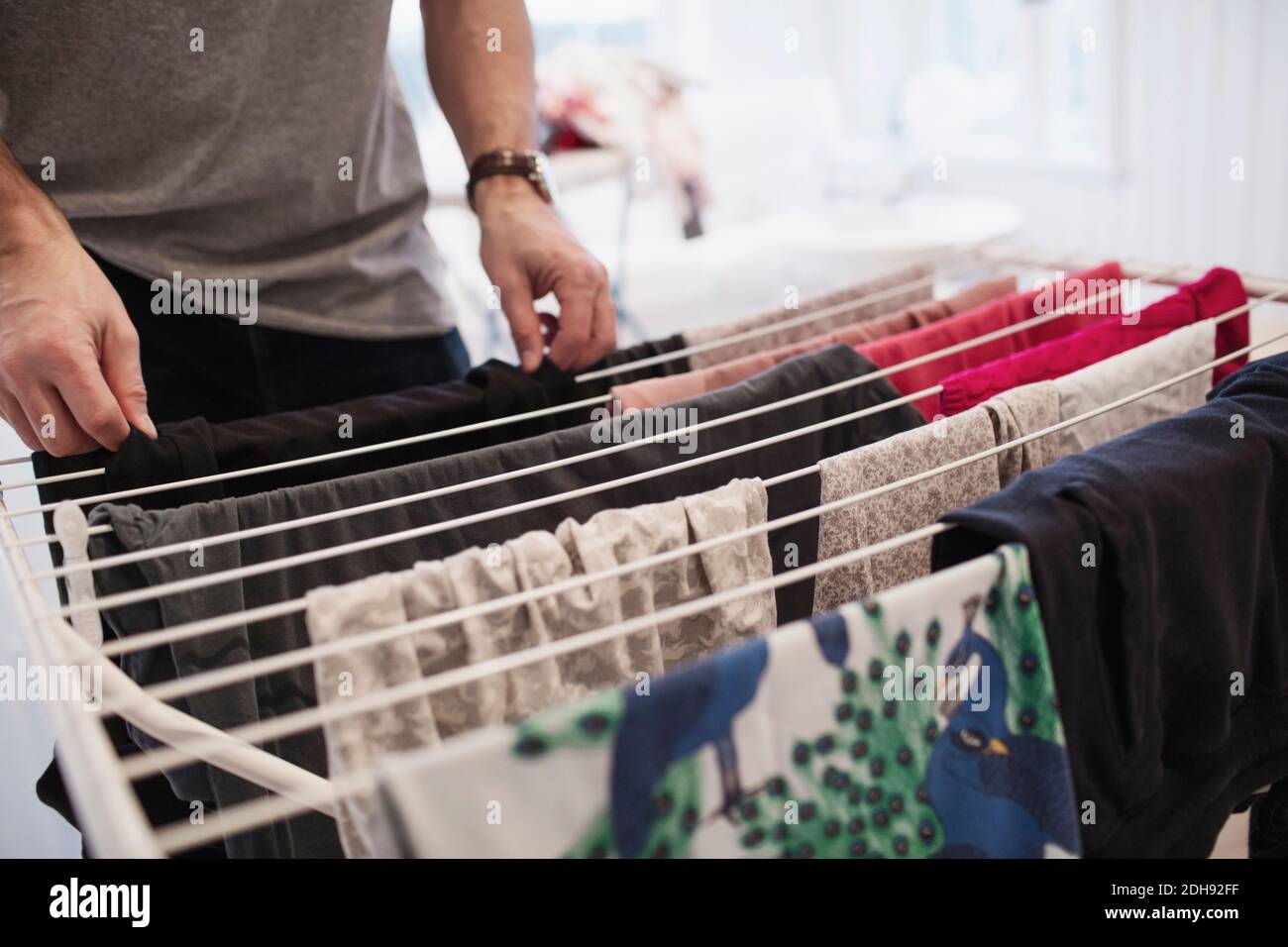 Drying clothes indoors hi-res stock photography and images - Alamy