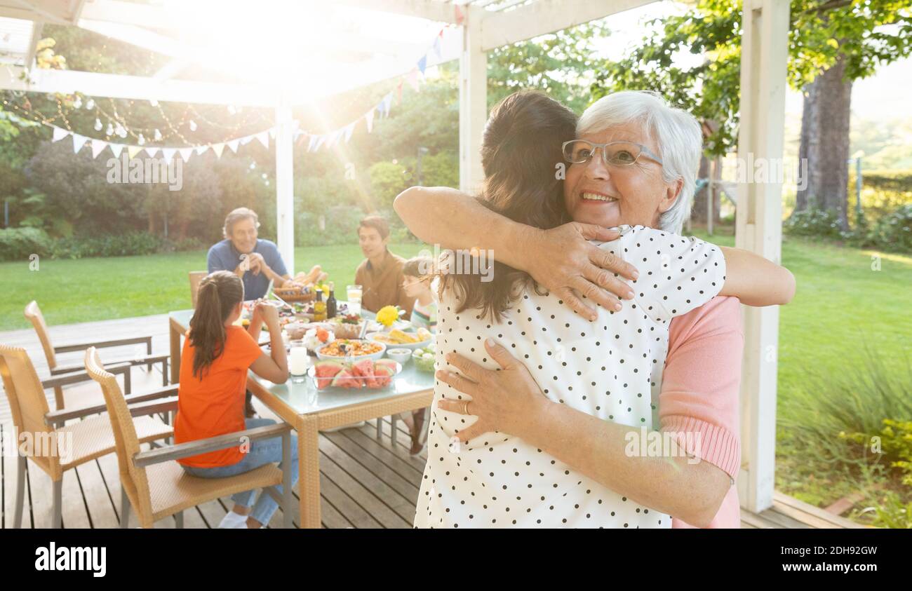 Multi generation family eating outside hi-res stock photography and ...