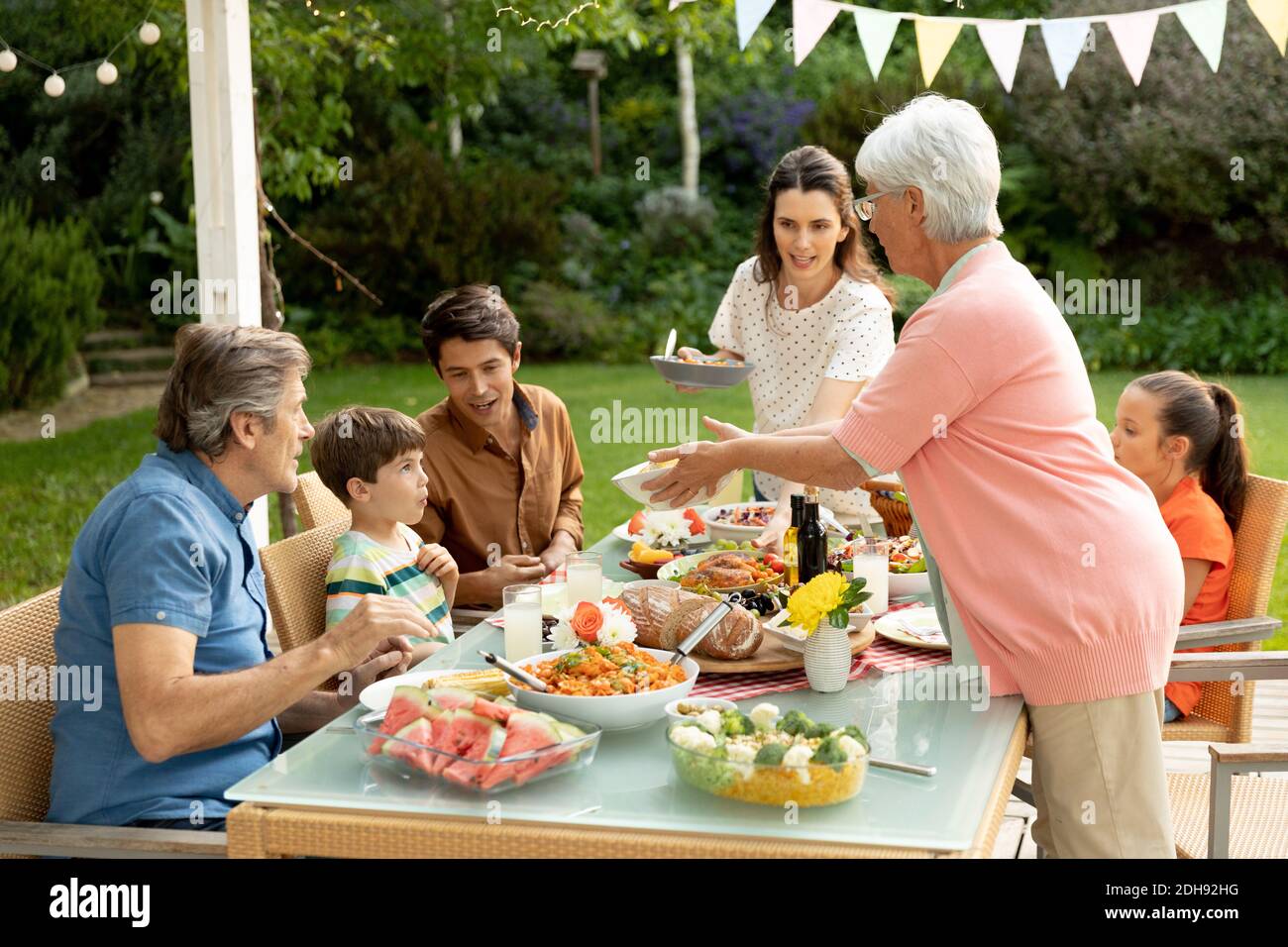 Family lunch outside grandmother table hi-res stock photography and ...