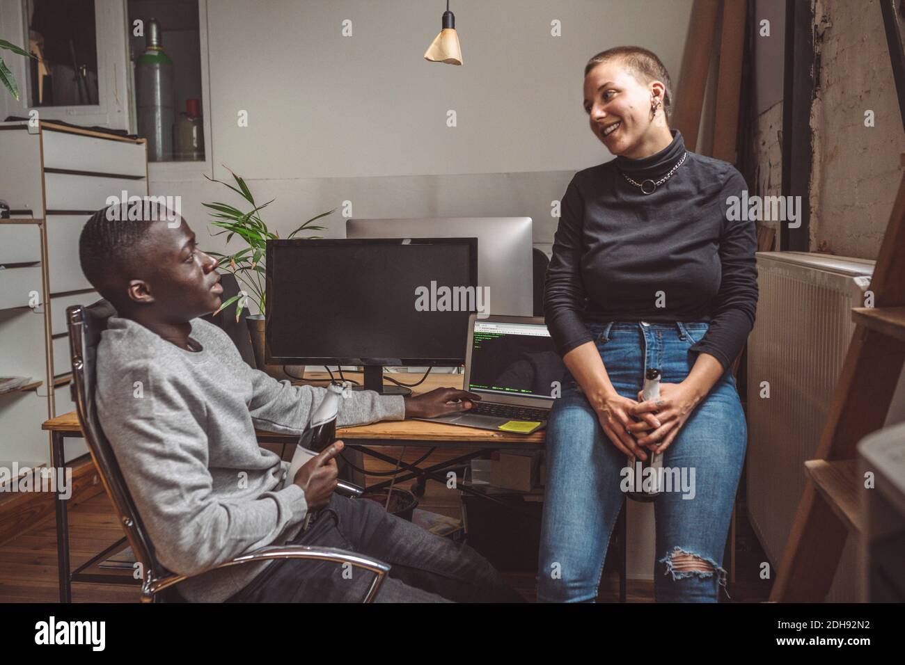 Talking to coworker hi-res stock photography and images - Alamy