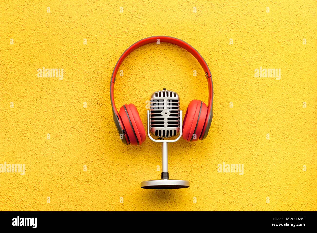Podcast and streaming record. Microphone and headphones on table, top ...