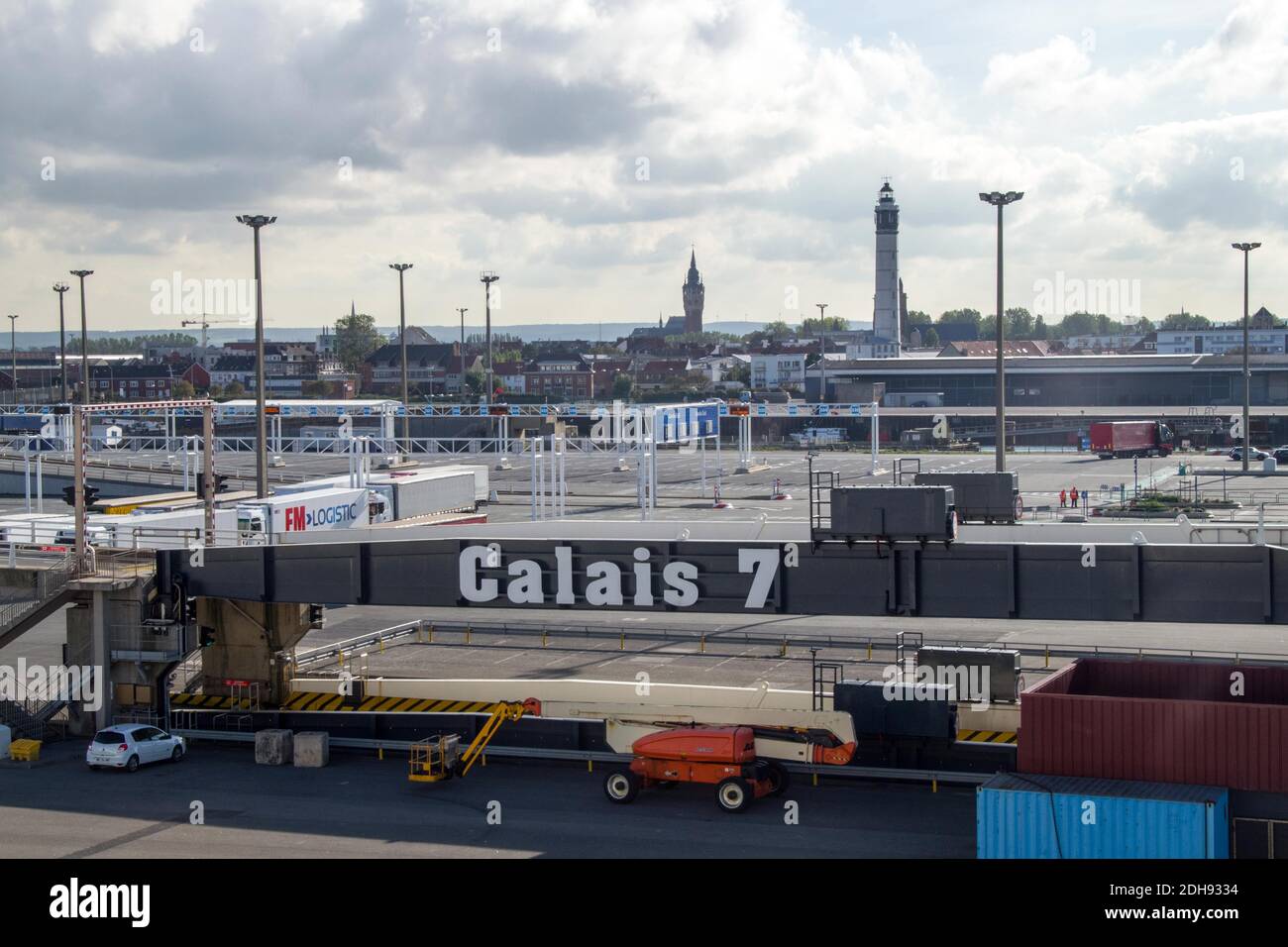 Embarkation facilities in the port of Calais with the famous town hall ...