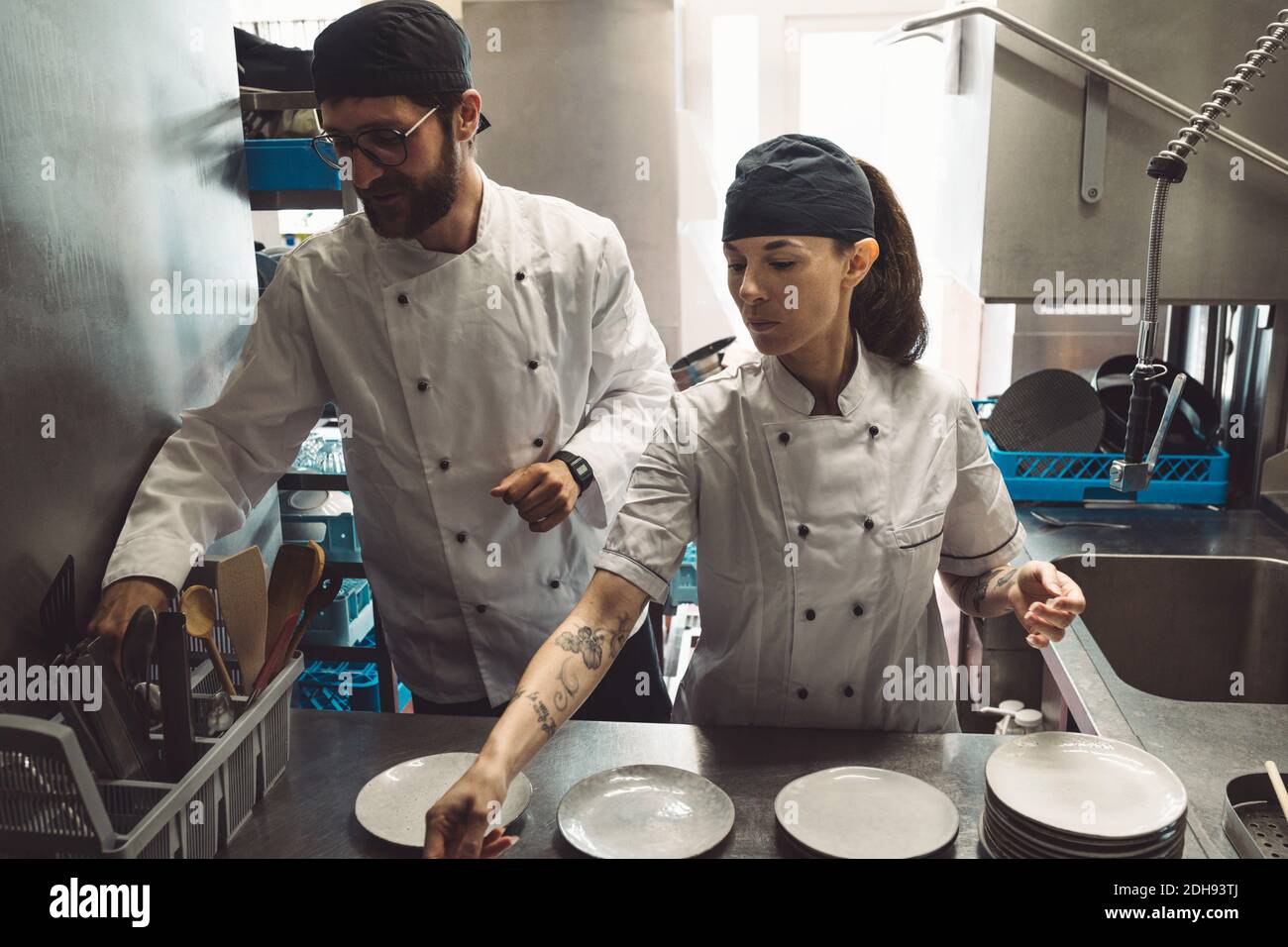 Working at counter hi-res stock photography and images - Alamy